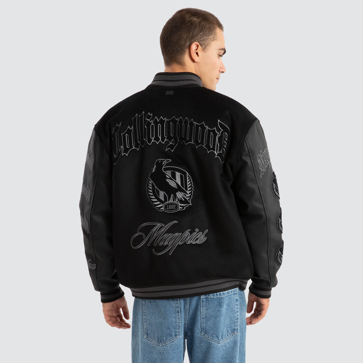 Collingwood Magpies AFL Ace Varsity Jacket in Black | NXP