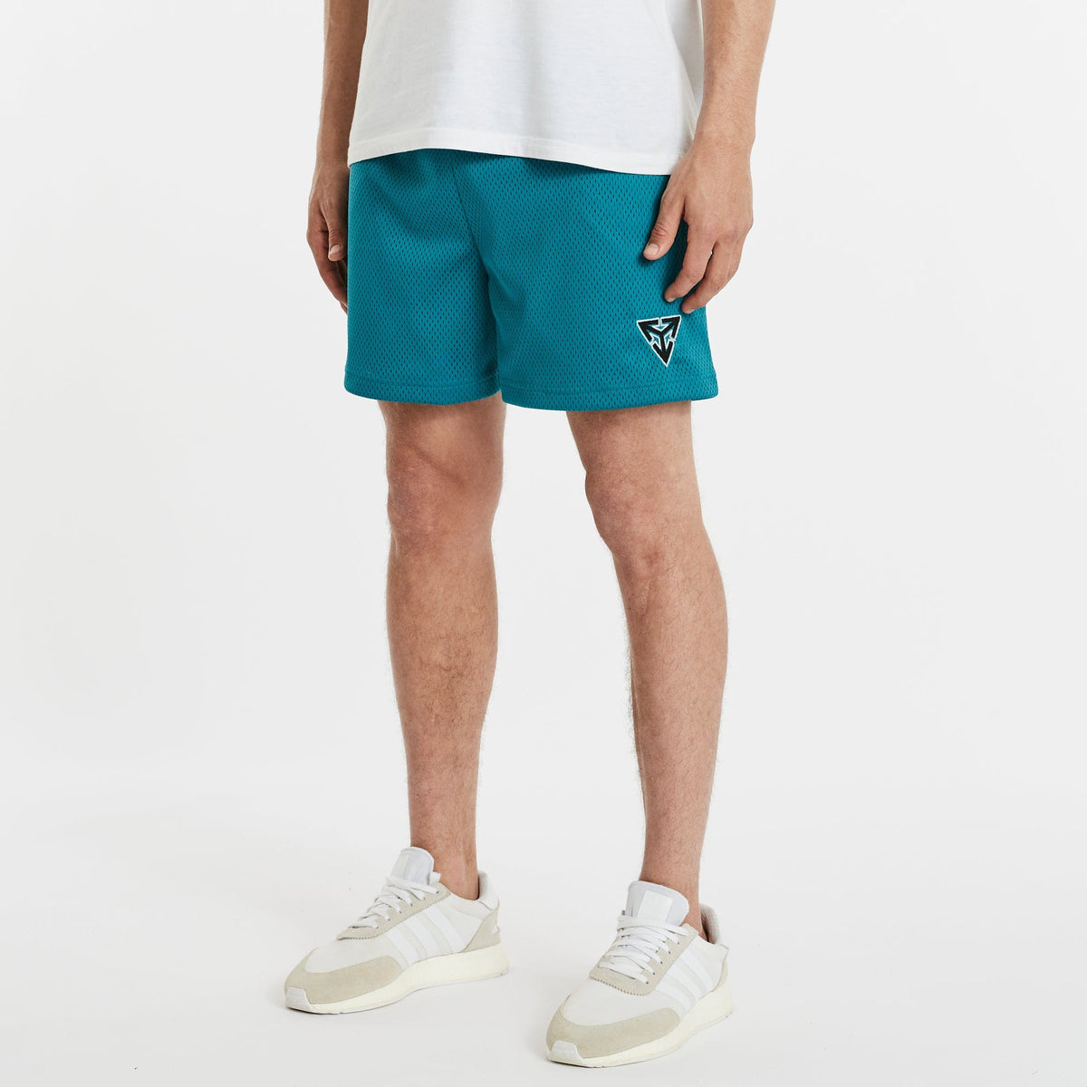 Saturation Warm Up Shorts Teal | NXP